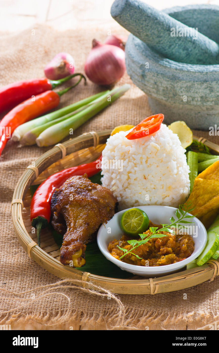 indonesian fried chicken rice Stock Photo - Alamy