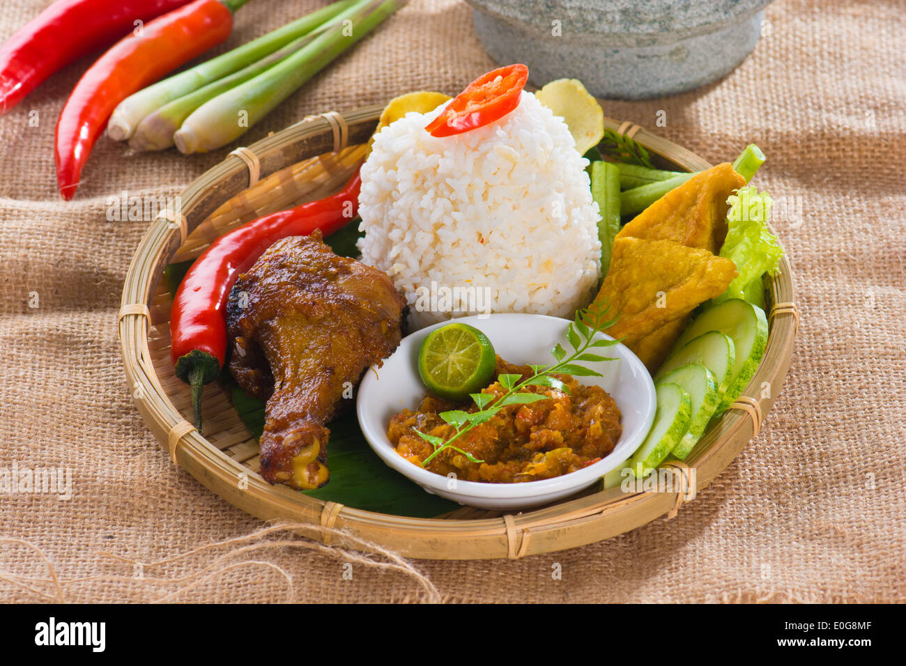 indonesian fried chicken rice Stock Photo - Alamy