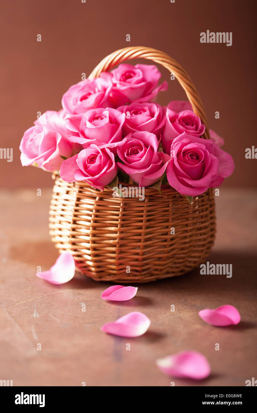 beautiful pink roses bouquet in basket Stock Photo - Alamy