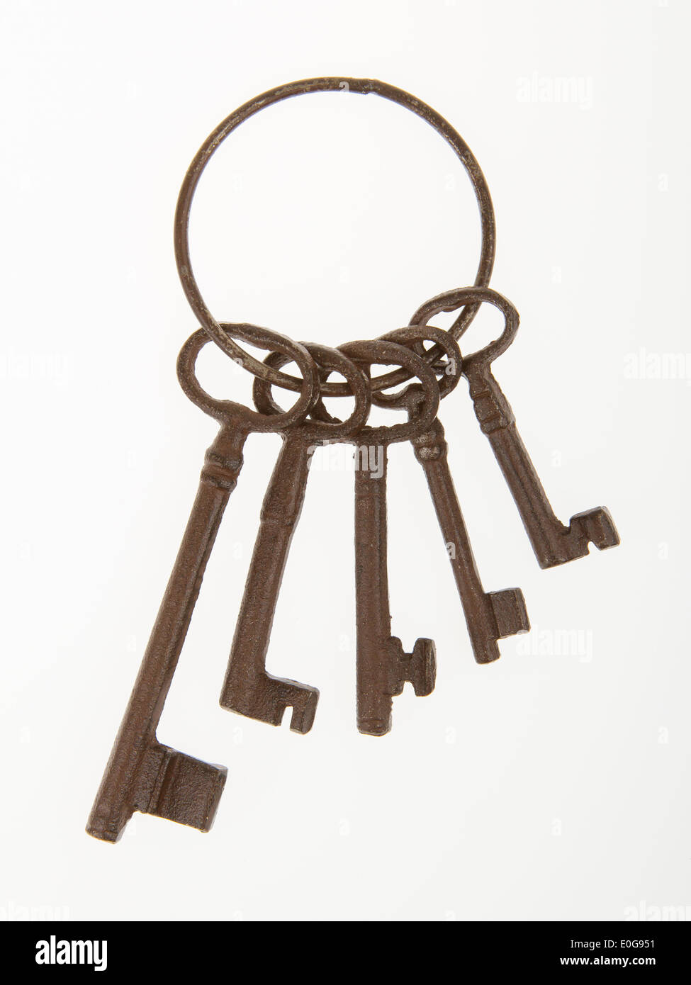 Antique keys on a ring on a white background Stock Photo - Alamy