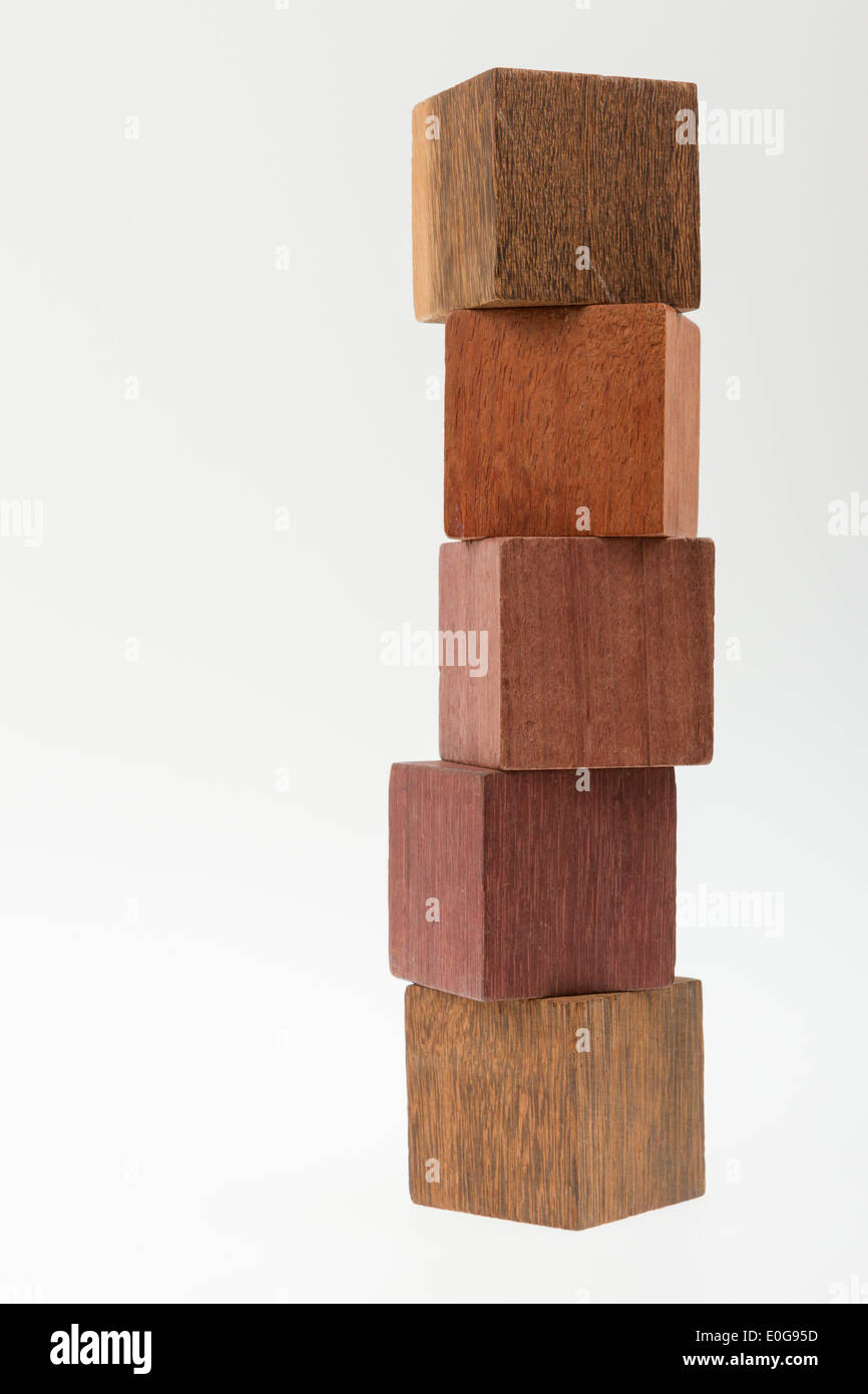 Several old cubes of wood, used by children for building (tropical wood ...