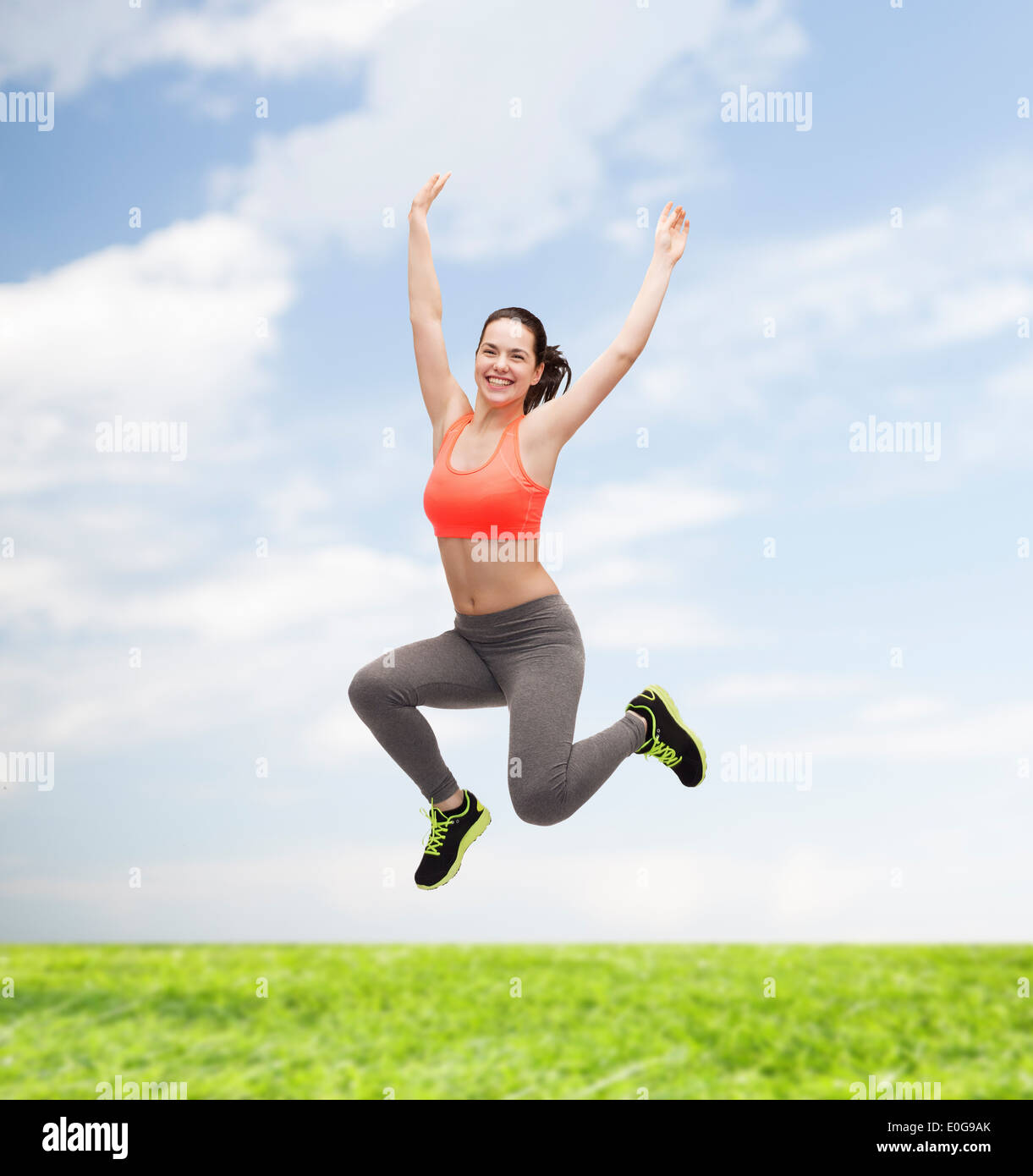 sporty teenage girl jumping in sportswear Stock Photo - Alamy