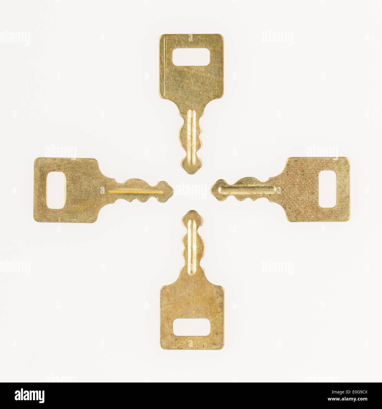 Four golden keys placed in a square, isolated on white background Stock ...