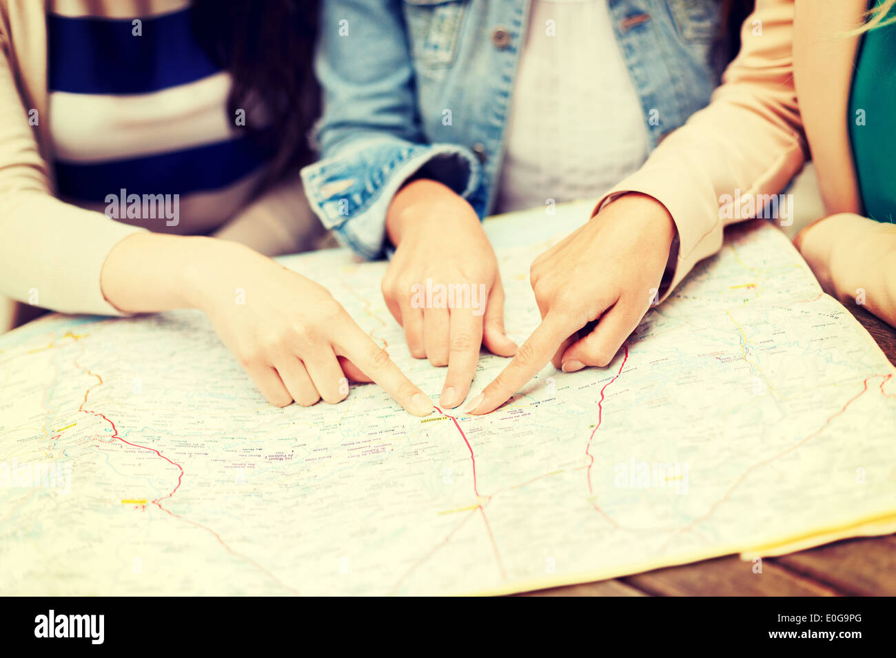 women with tourist map in the city Stock Photo - Alamy