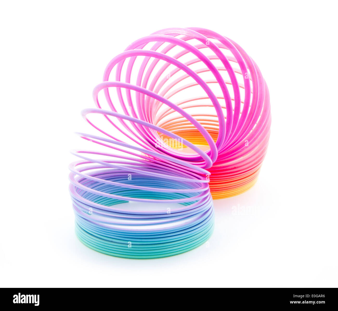 rainbow spiral spring isolated on white background Stock Photo - Alamy