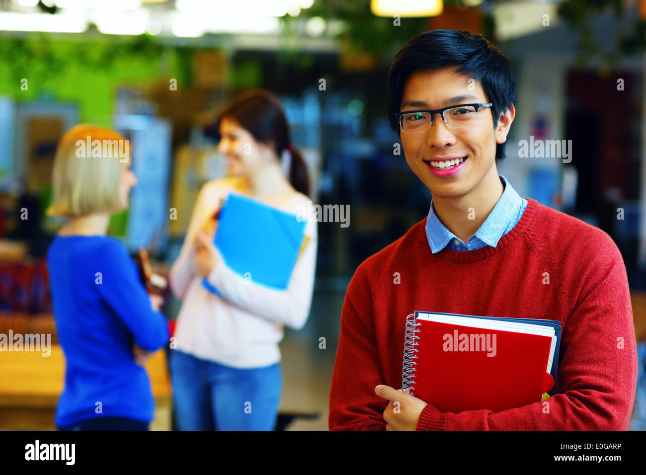 Group of young happy students at university campus Stock Photo - Alamy