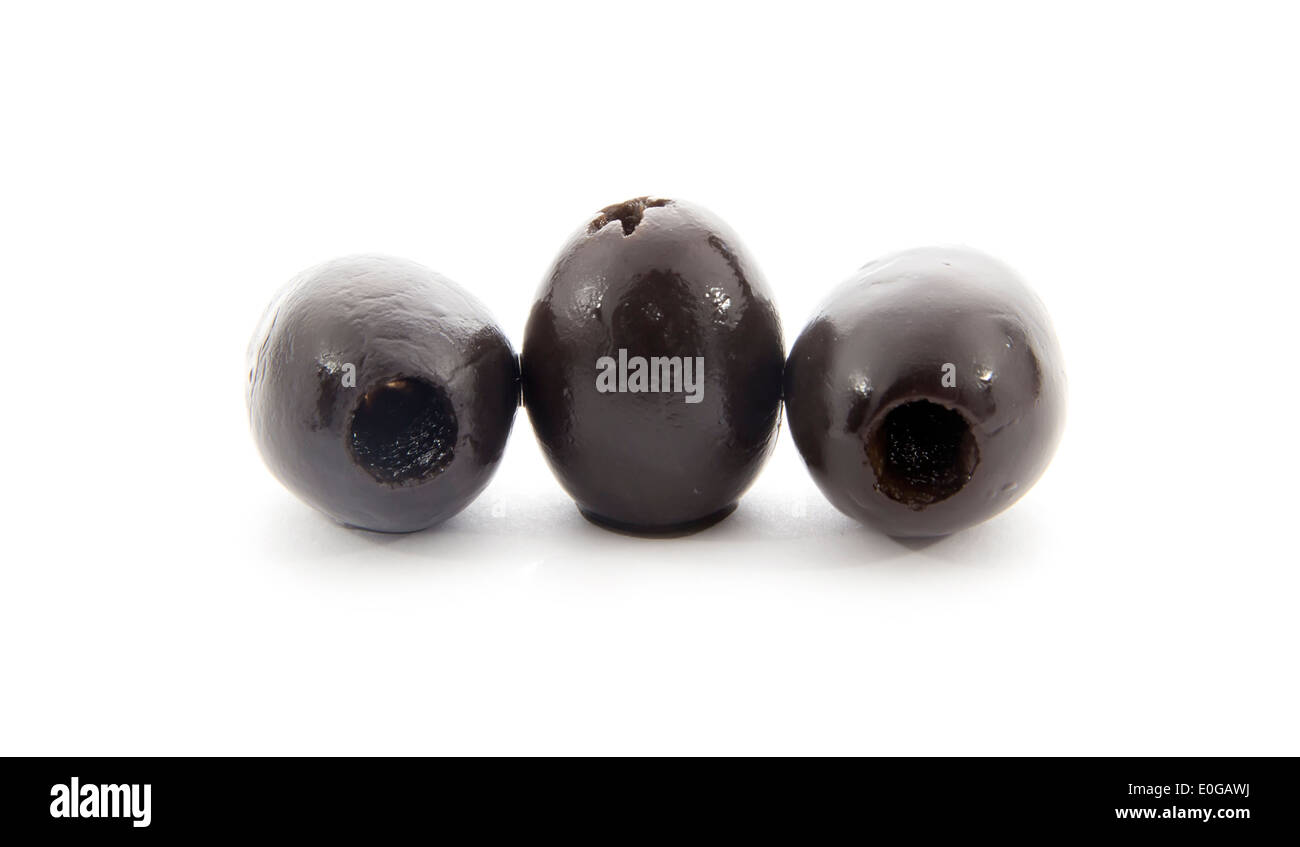 group of black olives isolated on white background Stock Photo - Alamy