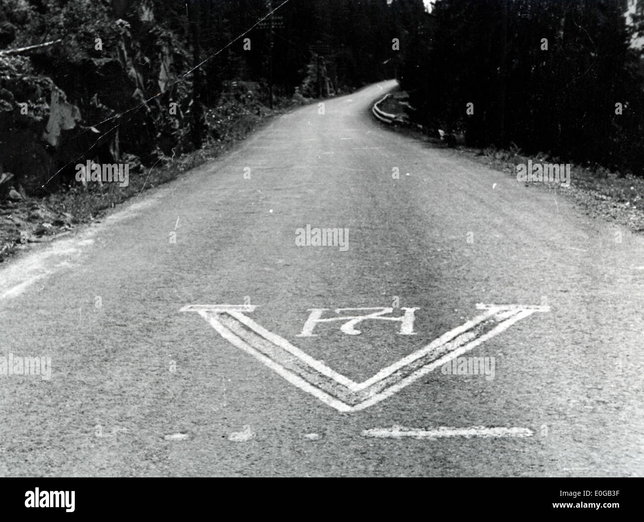 The image depicts a scene from the wartime occupation, showing a ...