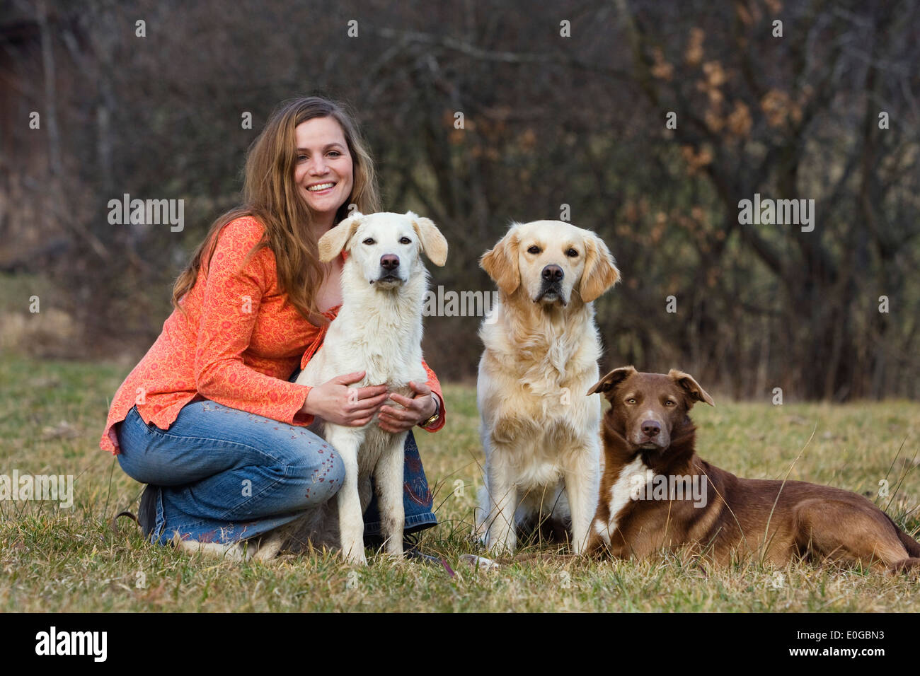 Woman with three dogs hi-res stock photography and images - Alamy