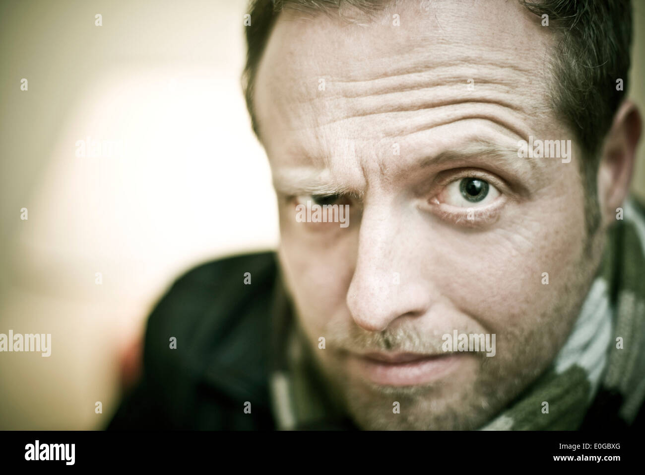 Suspicious man looking camera hi-res stock photography and images - Alamy