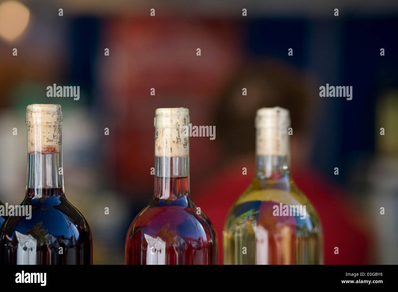Three wine bottles Stock Photo - Alamy