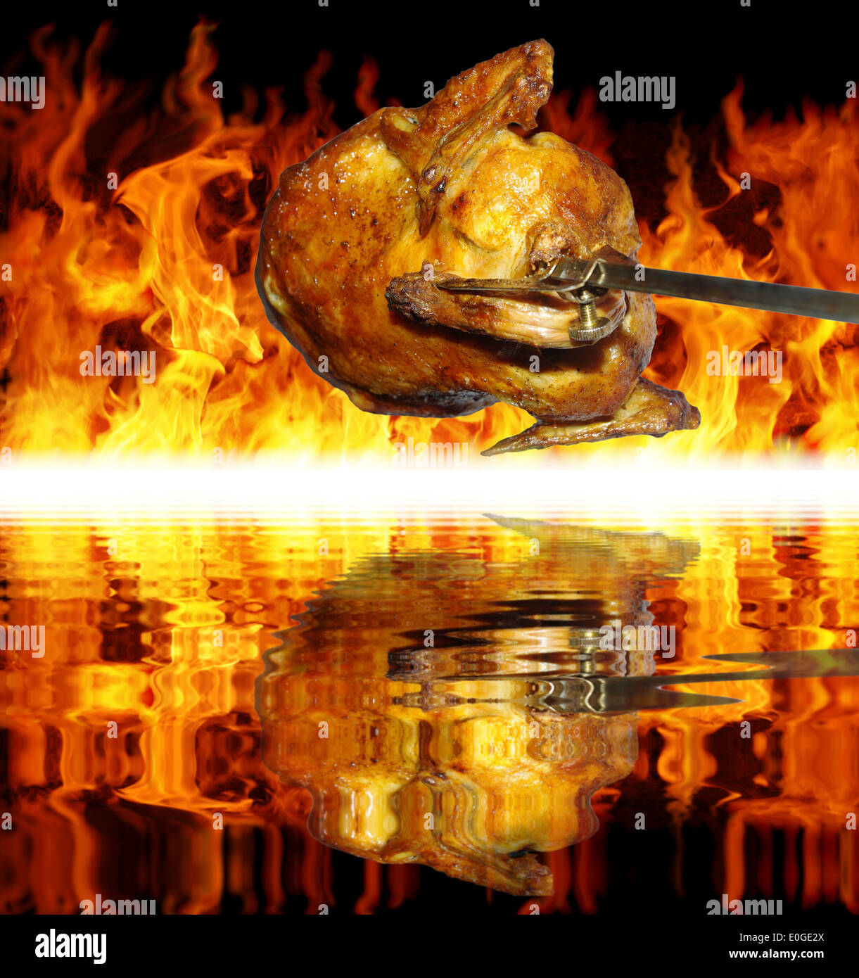 chicken on grill on background of flames Stock Photo - Alamy