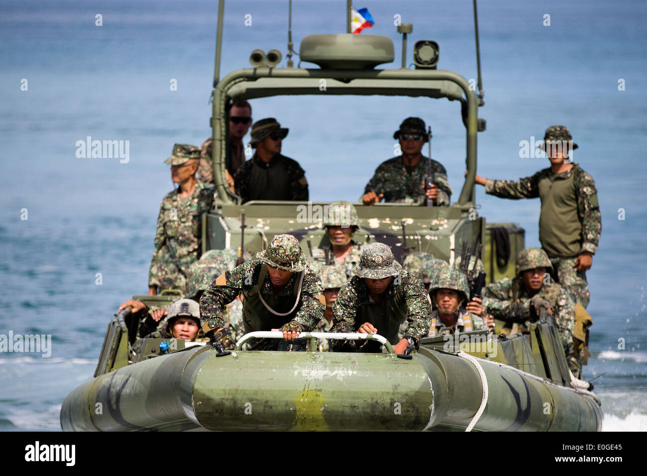 Philippine Marines approach the beach during an amphibious boat landing ... Philippine Marines approach the beach during an amphibious boat landing ...