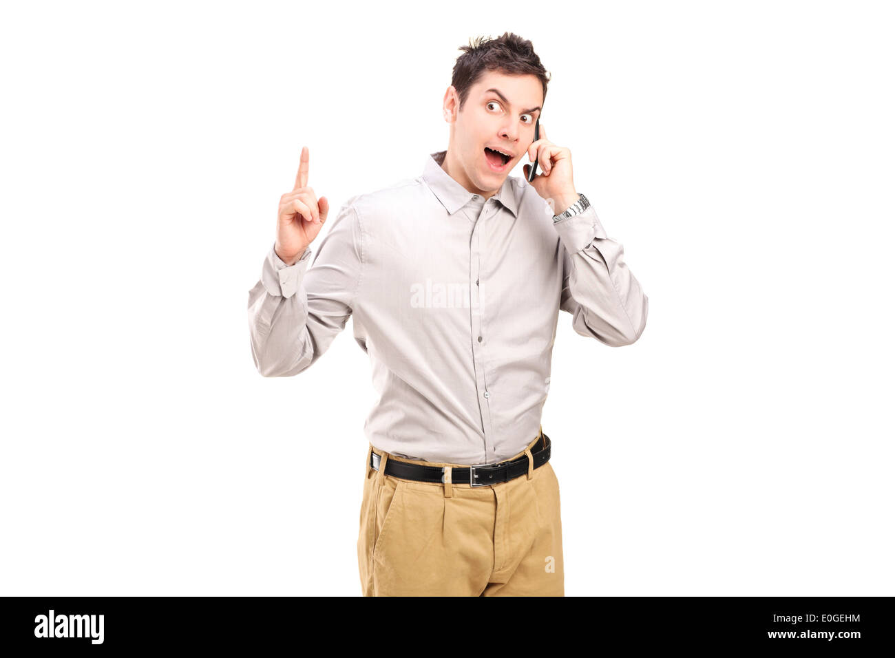 Angry man speaking on a cell phone Stock Photo - Alamy