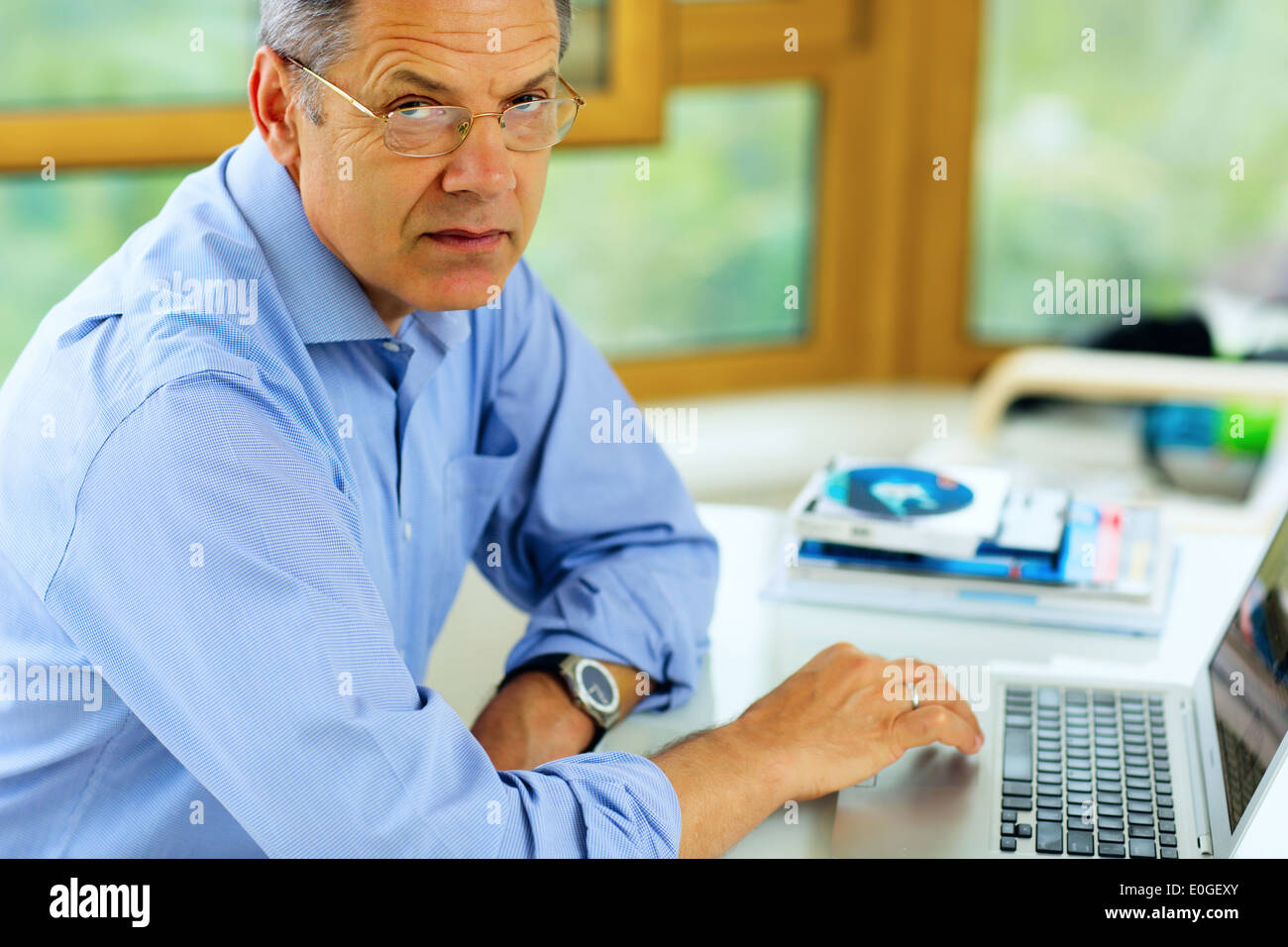 Closeup serious man working laptop hi-res stock photography and images ...