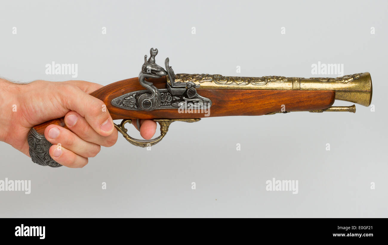 Old wooden gun isolated on white background Stock Photo - Alamy