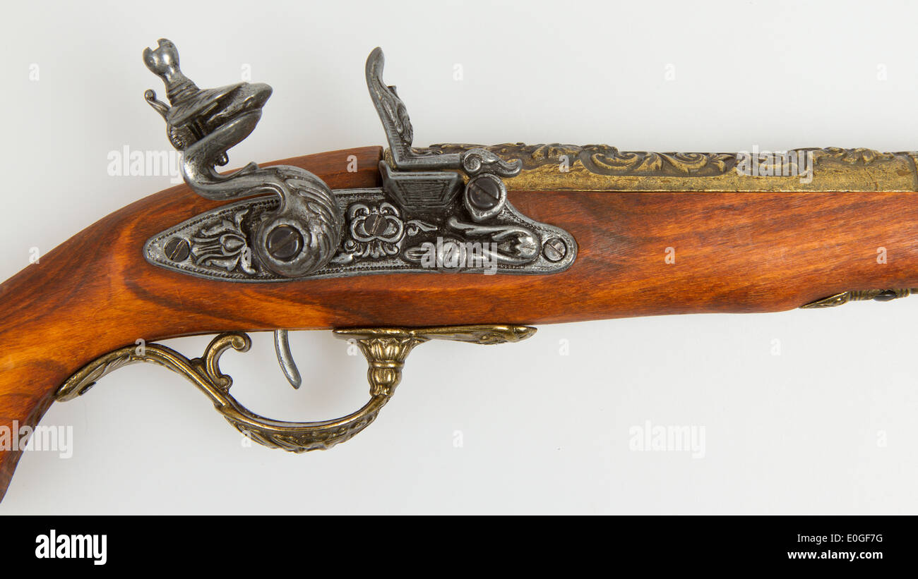 Old wooden gun isolated on white background Stock Photo - Alamy