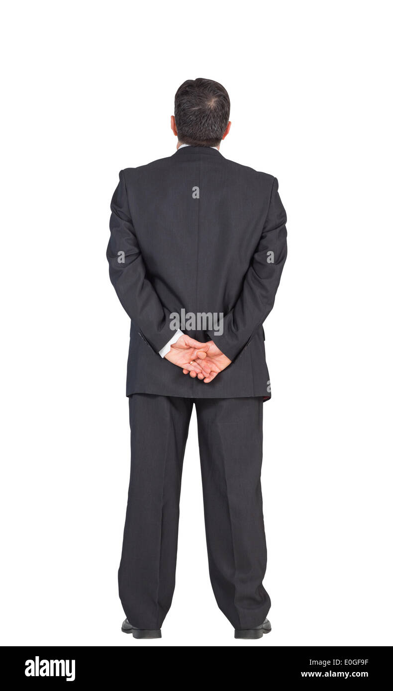 Man suit hands behind back hi-res stock photography and images - Alamy