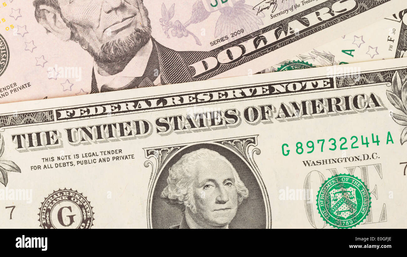 Several paper american dollars isolated in close-up (1, 5, 10, 20 Stock ...