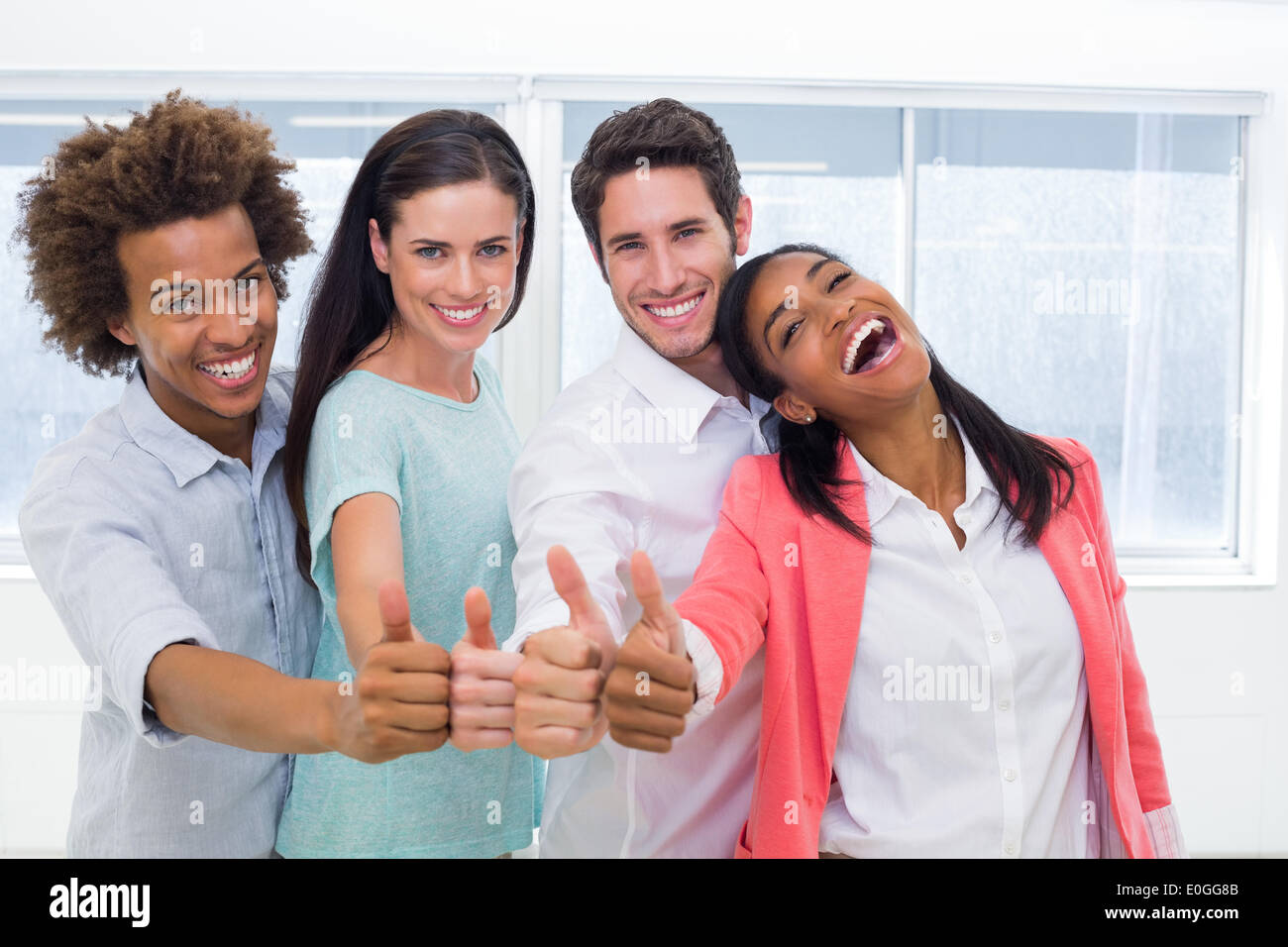 Four hands giving thumbs up hi-res stock photography and images - Alamy