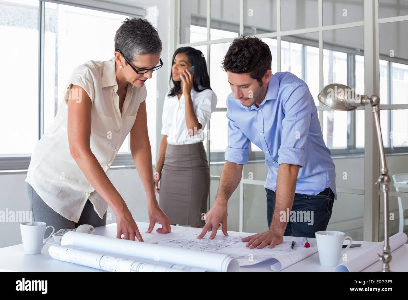 Casual architecture team working together Stock Photo - Alamy