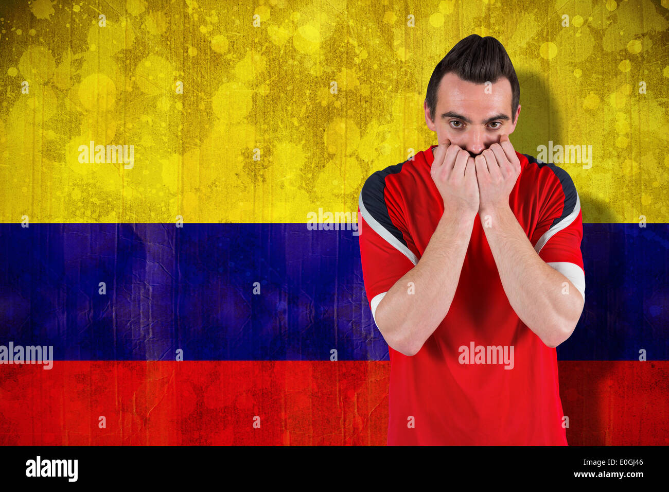 Nervous football fan looking ahead Stock Photo - Alamy