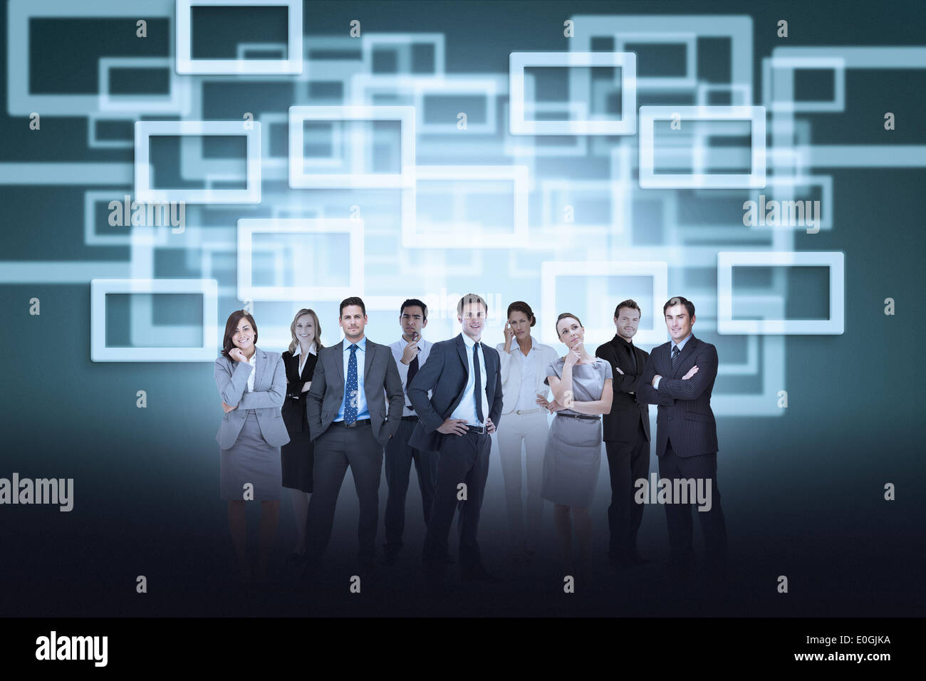 Group of business partners looking at camera Stock Photo - Alamy