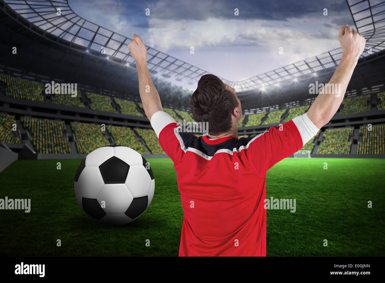 Excited football fan cheering Stock Photo - Alamy