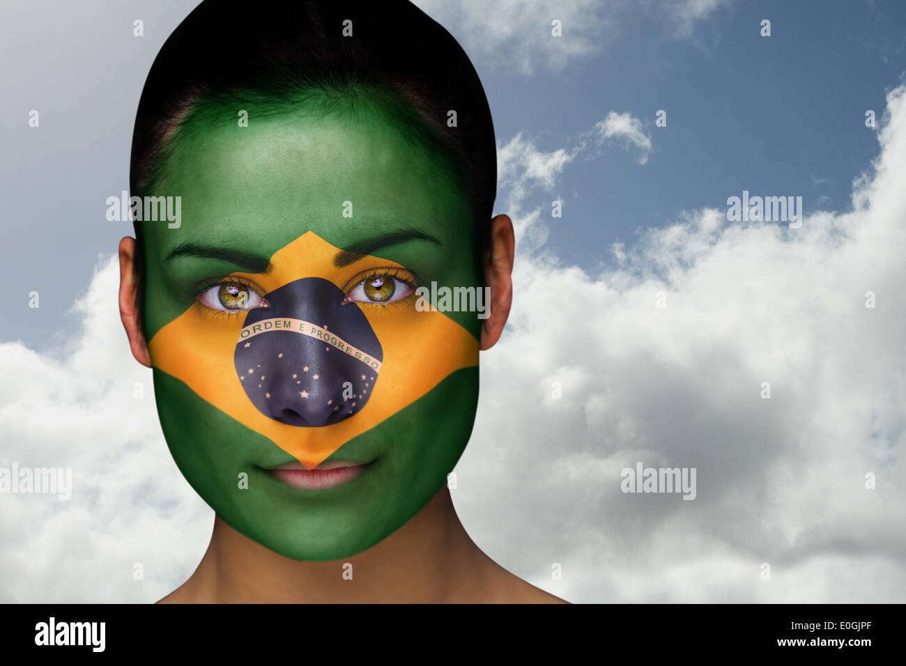 Beautiful brunette in brasil facepaint Stock Photo - Alamy