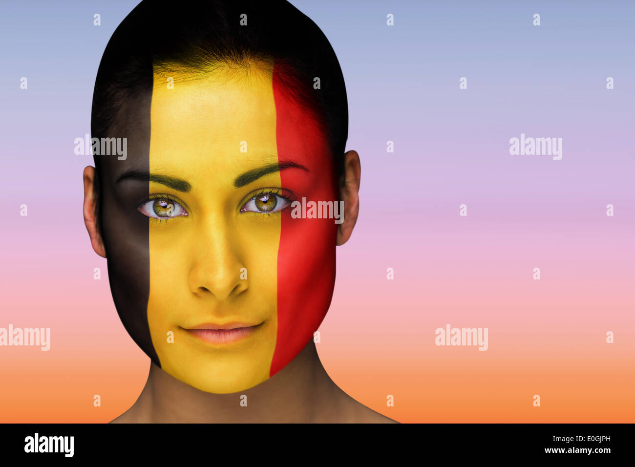 Beautiful brunette in belgium facepaint Stock Photo - Alamy