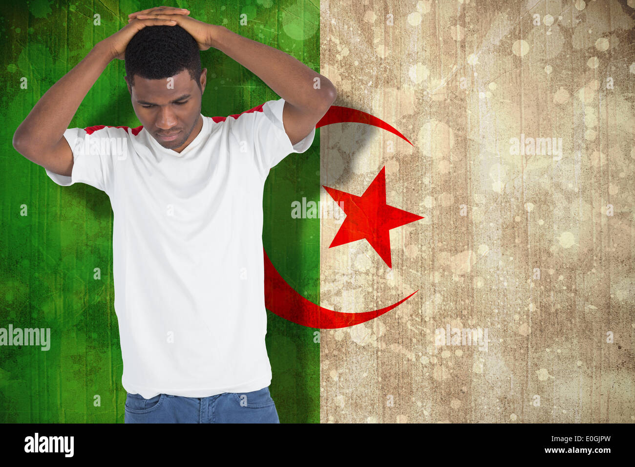 Disappointed football fan looking down Stock Photo - Alamy