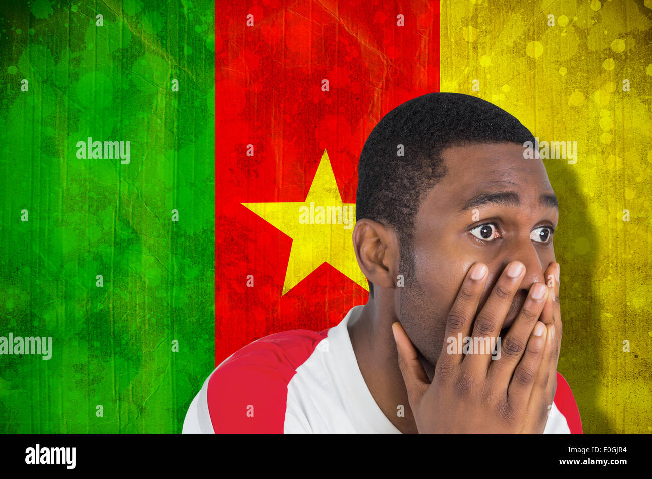 Nervous football fan looking ahead Stock Photo - Alamy