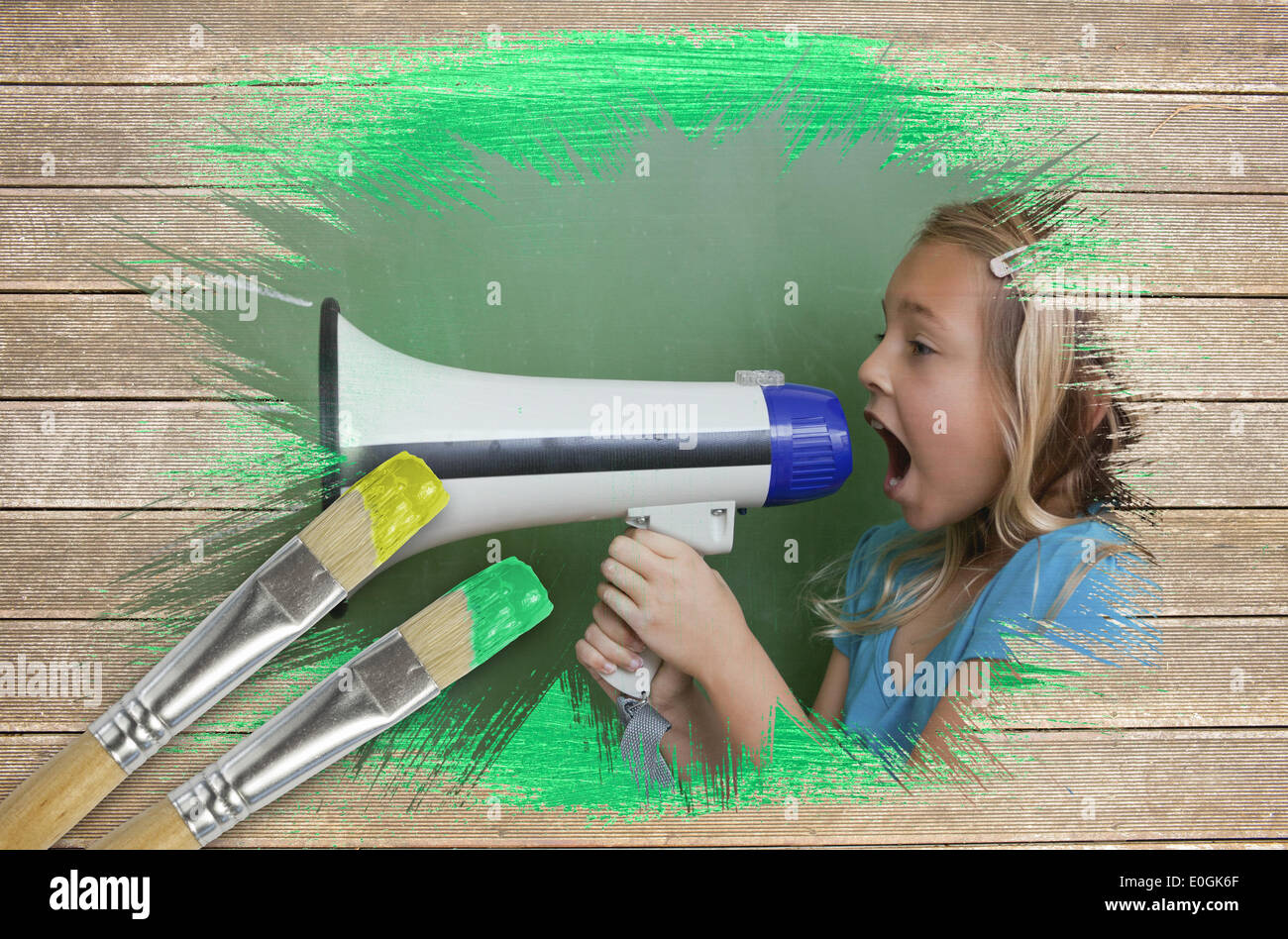 Composite image of little girl with bullhorn Stock Photo - Alamy
