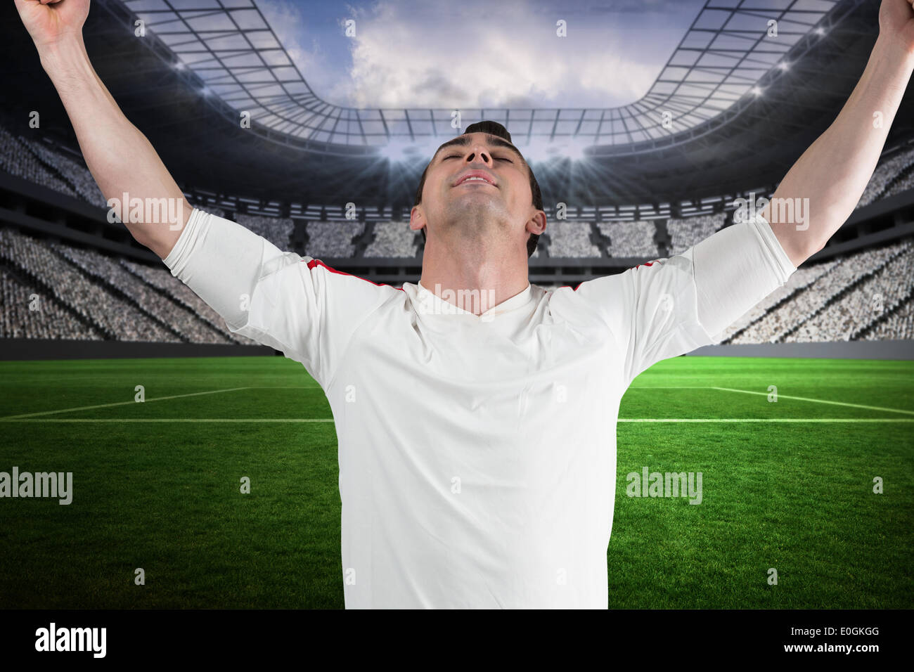 Excited football fan cheering Stock Photo - Alamy