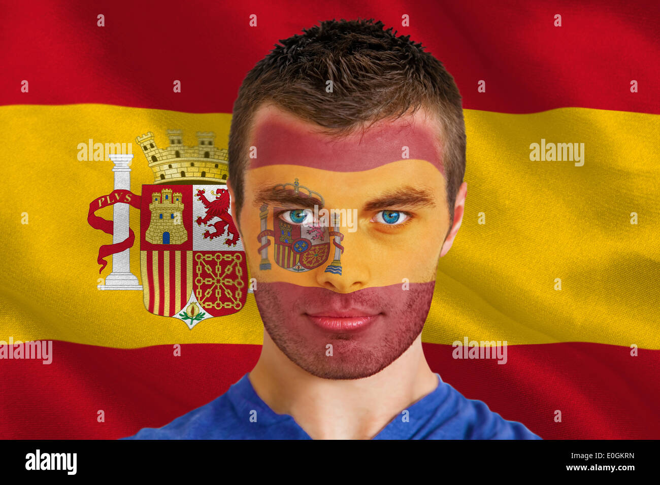 Serious young spain fan with facepaint Stock Photo - Alamy