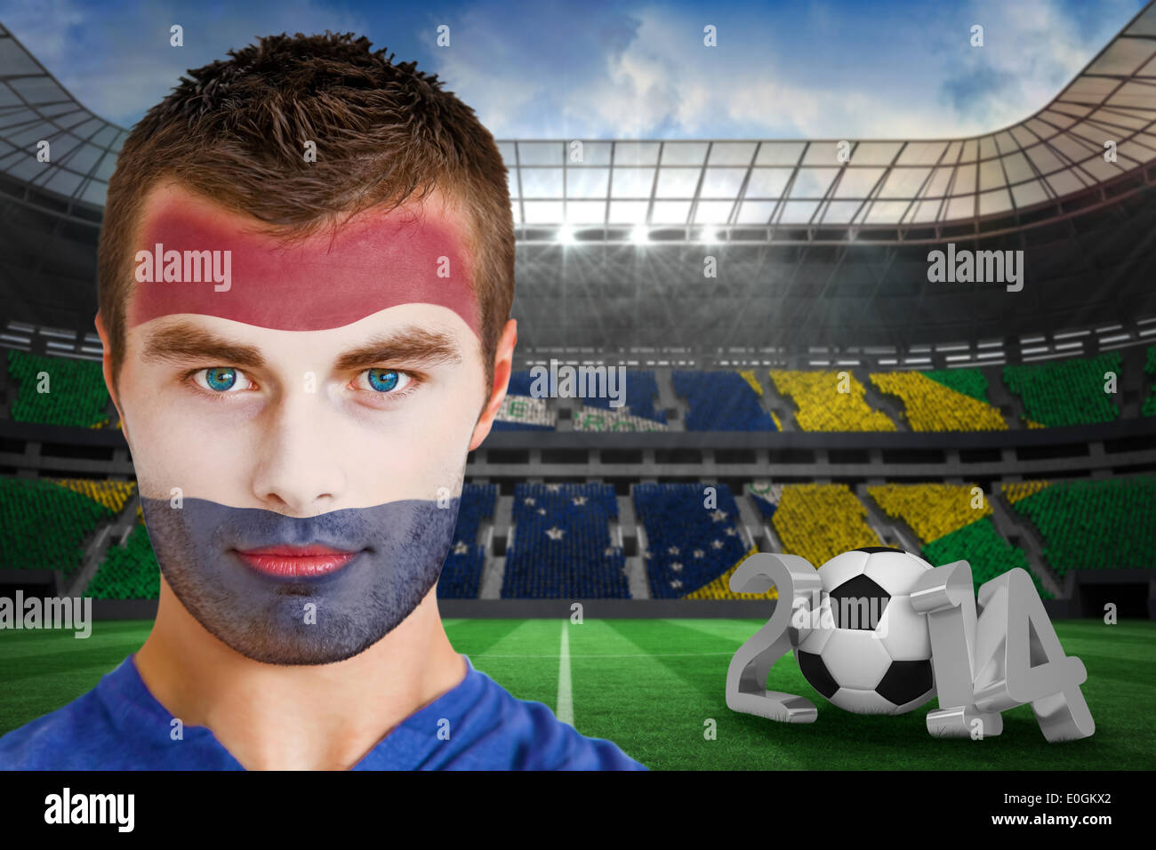 Serious young russia fan with face paint Stock Photo - Alamy