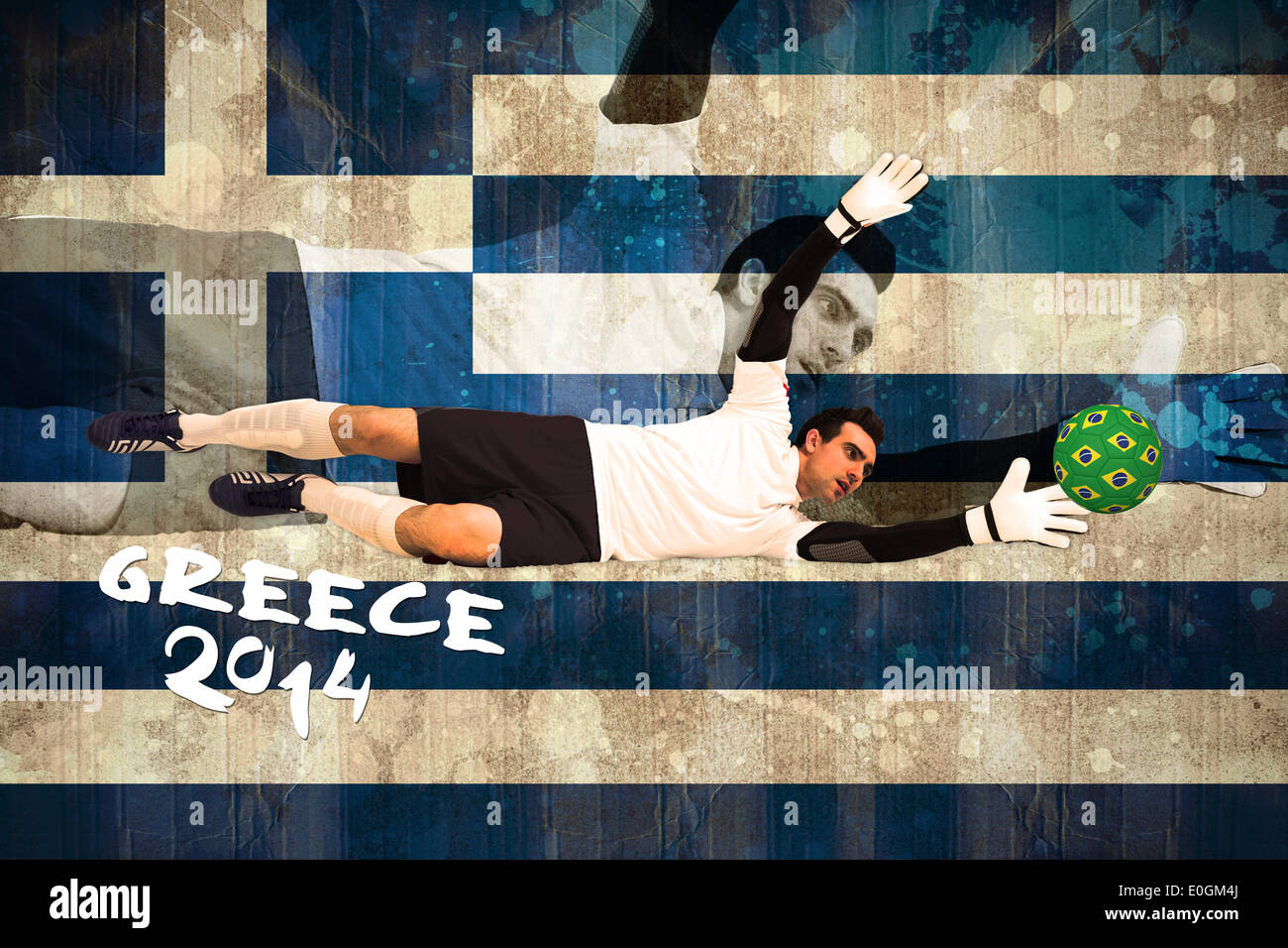 Goalkeeper in white making a save Stock Photo - Alamy