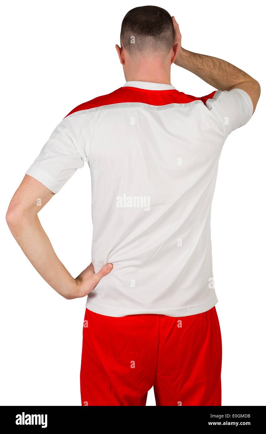 Disappointed football player looking down Stock Photo - Alamy