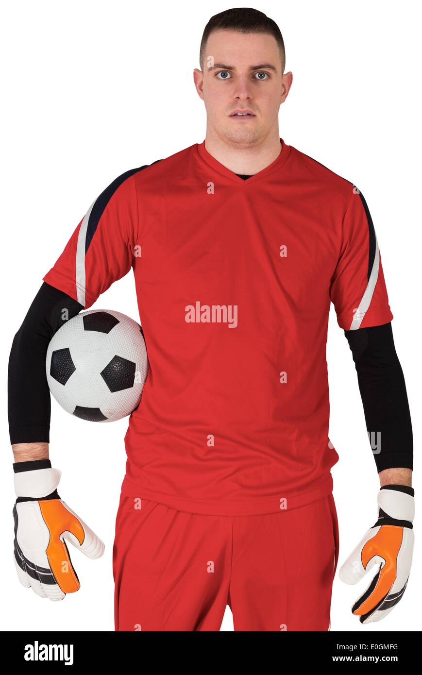 Goalkeeper in red looking at camera Stock Photo - Alamy