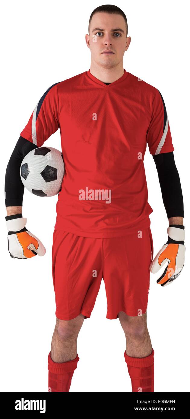 Goalkeeper in red looking at camera Stock Photo - Alamy