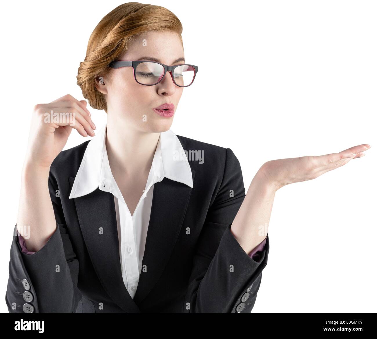 Businesswoman holding hand out in presentation Stock Photo - Alamy