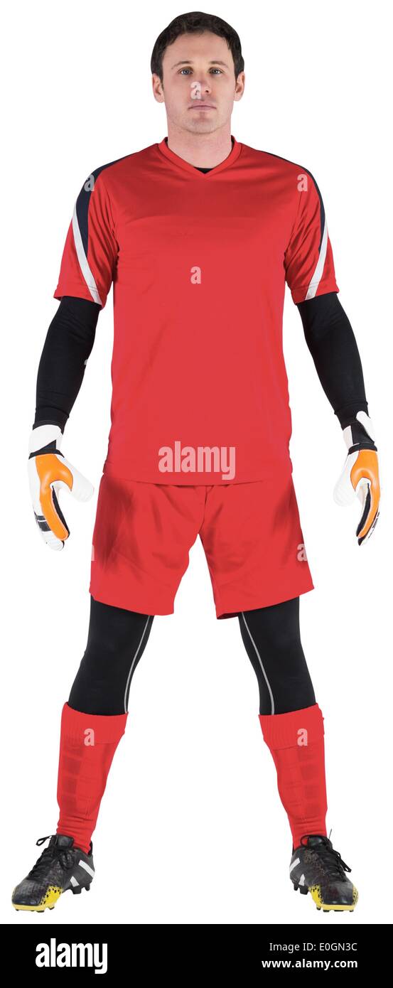 Goalkeeper in red looking at camera Stock Photo - Alamy