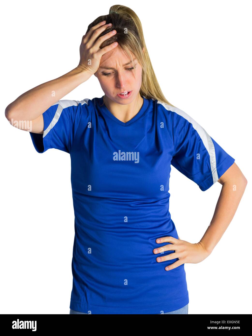 Disappointed football fan in blue jersey Stock Photo - Alamy