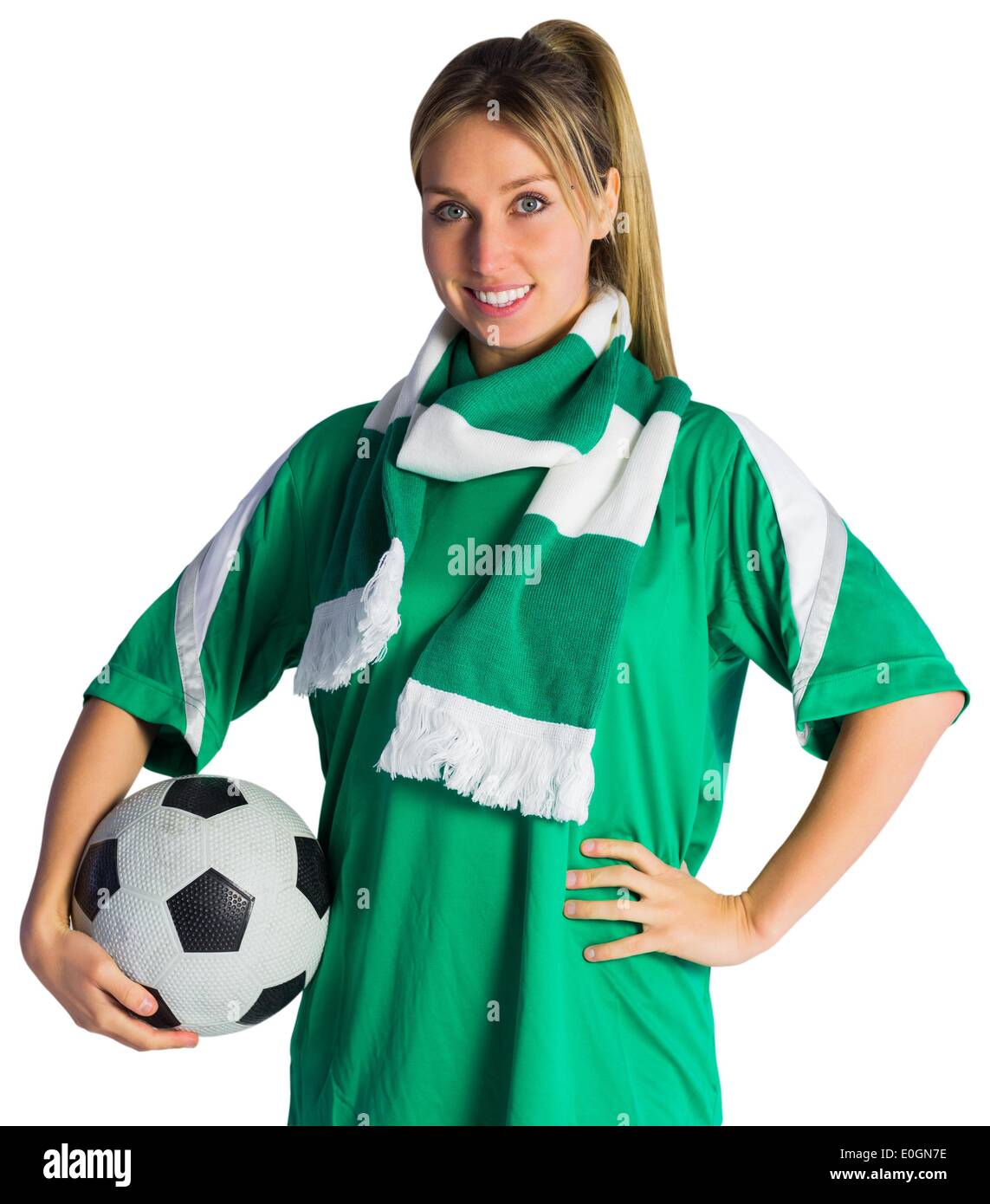 Pretty football fan in green jersey Stock Photo - Alamy