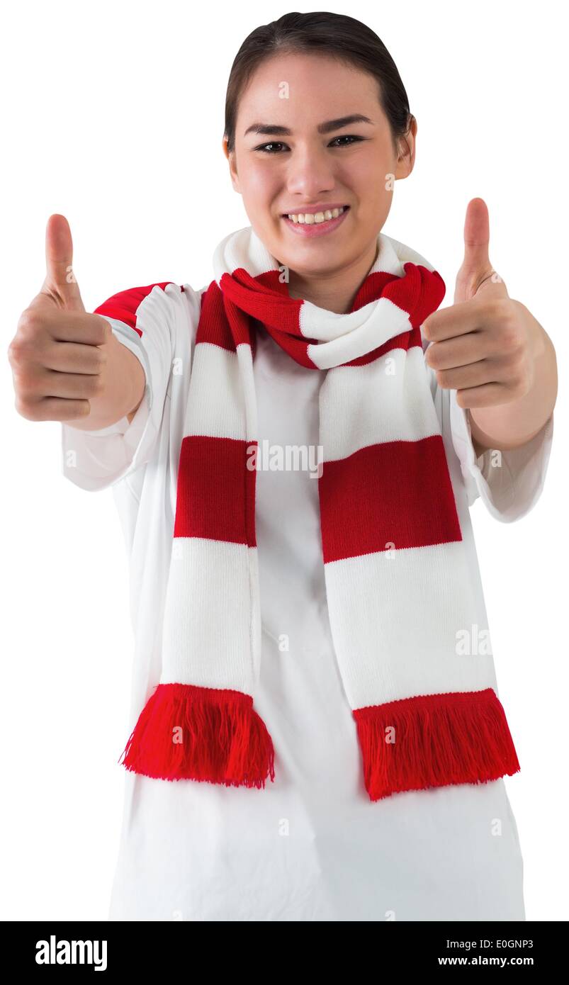 Football fan in white wearing scarf showing thumbs up Stock Photo - Alamy