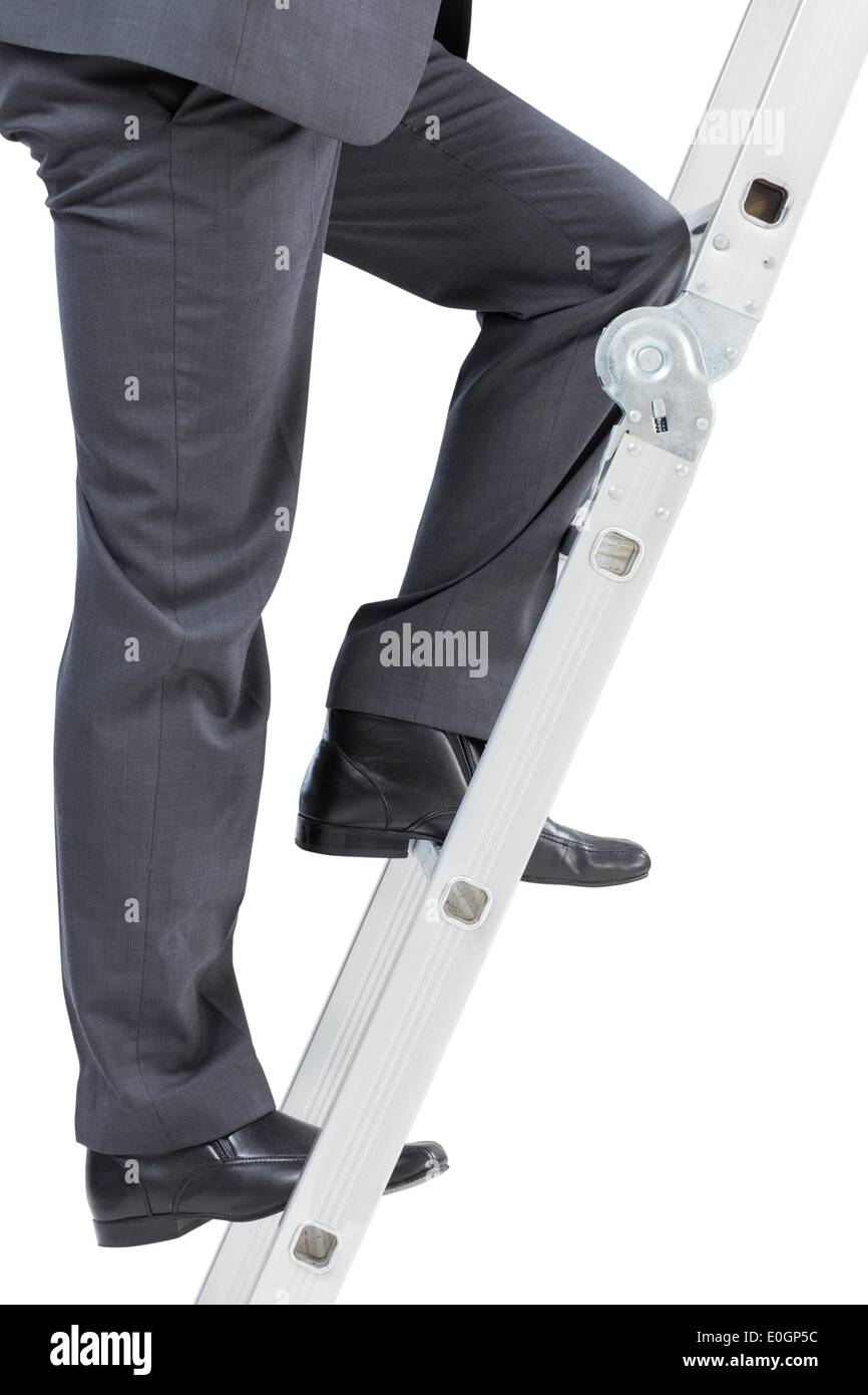 Businessman climbing up ladder Stock Photo - Alamy