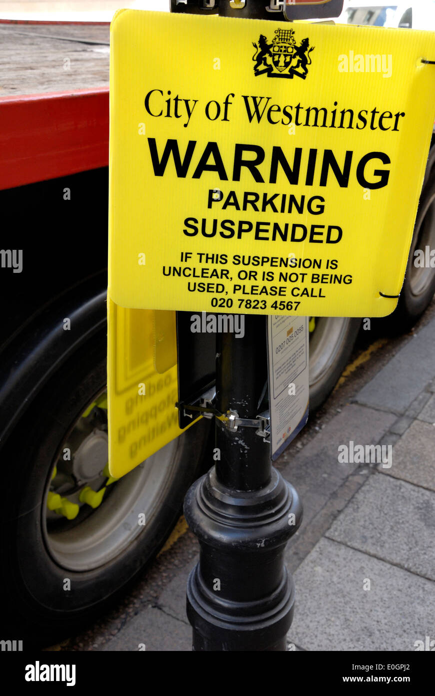 Suspended parking warning sign hi-res stock photography and images - Alamy