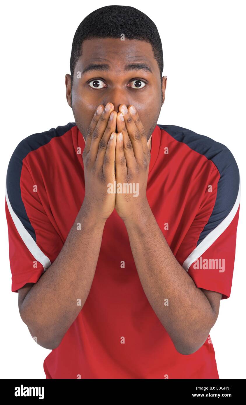 Nervous football fan looking ahead Stock Photo - Alamy