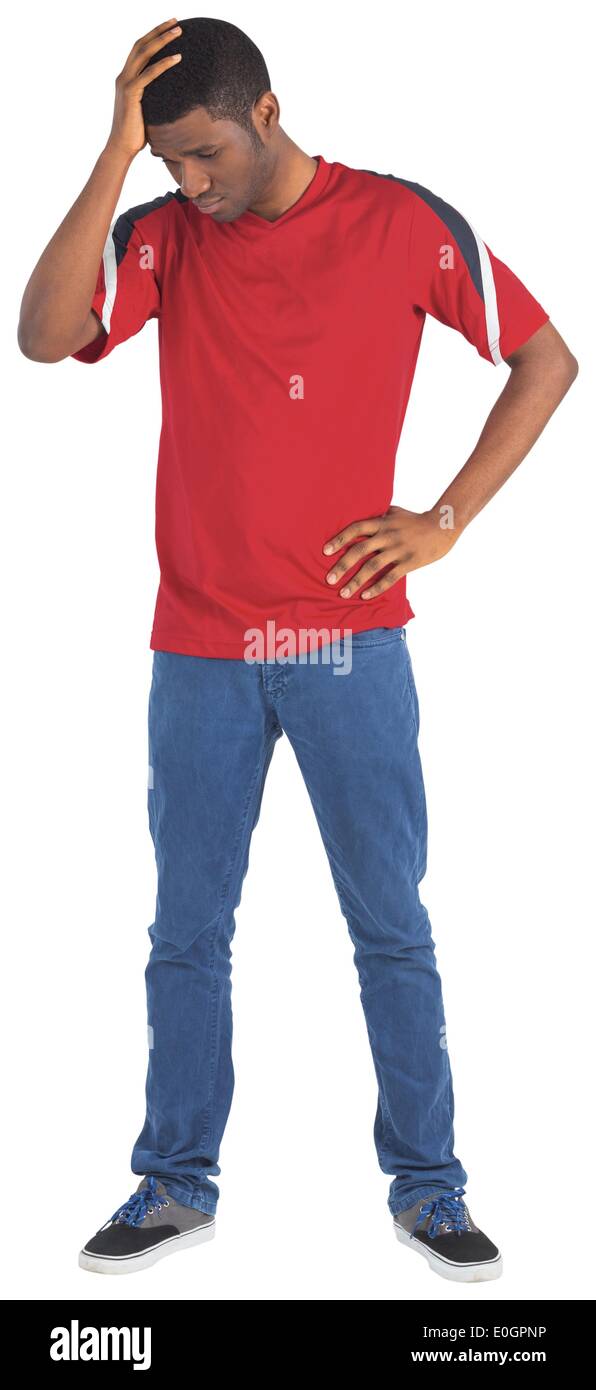 Disappointed football fan looking down Stock Photo - Alamy