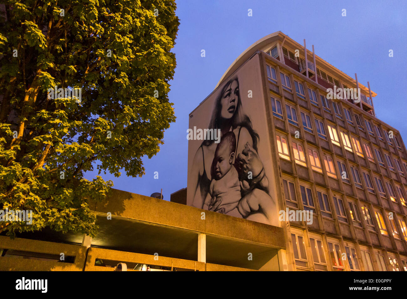 Graffiti artist El Mac's work entitled 'Woman and Child' in the city of ...